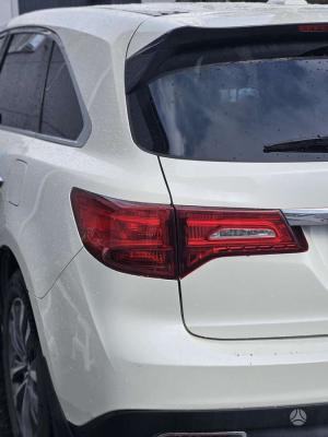 White Acura MDX 2016 in Vilnius, with an engine capacity of 3.50 L and mileage of 209 thousand km for 13500 €, photo 9 on AUTOMOTO.COM.LV