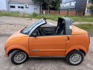 Orange Aixam Scouty 2006 in Taurage, with an engine capacity of 0.40 L and mileage of 100 thousand km for 2600 €, photo 3 on AUTOMOTO.COM.LV