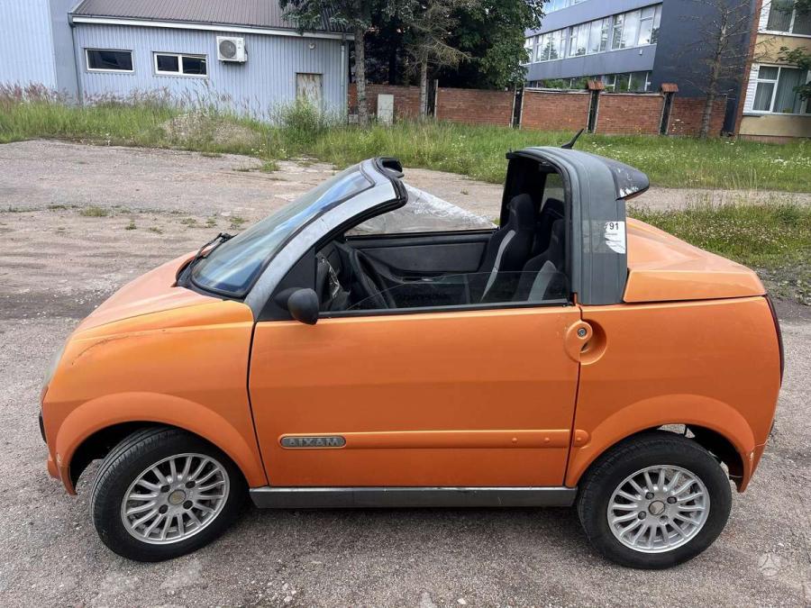 Orange Aixam Scouty 2006 in Taurage, with an engine capacity of 0.40 L and mileage of 100 thousand km for 2600 €, photo 3 on AUTOMOTO.COM.LV