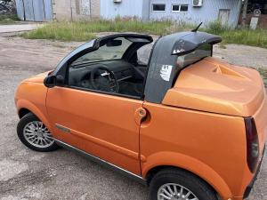 Orange Aixam Scouty 2006 in Taurage, with an engine capacity of 0.40 L and mileage of 100 thousand km for 2600 €, photo 5 on AUTOMOTO.COM.LV