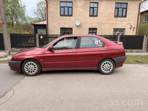 Red Alfa Romeo 146 1996 in Riga, with an engine capacity of 2.00 L and mileage of 224 thousand km for 2900 €, photo 3 on AUTOMOTO.COM.LV