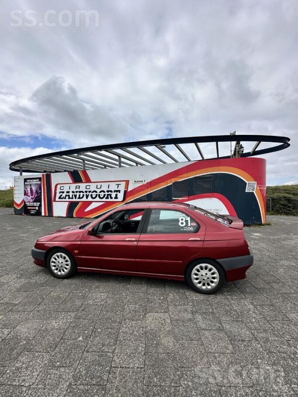 Sarkans Alfa Romeo 146 1996 Rīga, ar dzinēja tilpumu 2.00 L un nobraukumu 224 tūkst. km par 2900 €, foto 7 vietnē AUTOMOTO.COM.LV