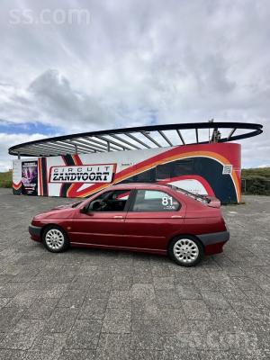 Red Alfa Romeo 146 1996 in Riga, with an engine capacity of 2.00 L and mileage of 224 thousand km for 2900 €, photo 8 on AUTOMOTO.COM.LV