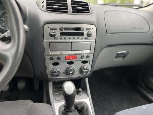 Sarkans Alfa Romeo 147 2005 Viļņa, ar dzinēja tilpumu 1.60 L un nobraukumu 184 tūkst. km par 1400 €, foto 14 vietnē AUTOMOTO.COM.LV
