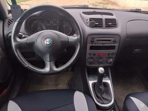 Red Alfa Romeo 147 2005 in Ukmerge, with an engine capacity of 1.60 L and mileage of 84 thousand km for 750 €, photo 7 on AUTOMOTO.COM.LV