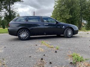 Black Alfa Romeo 156 2005 in Joniskis, with an engine capacity of 1.90 L and mileage of 286 thousand km for 599 €, photo 13 on AUTOMOTO.COM.LV