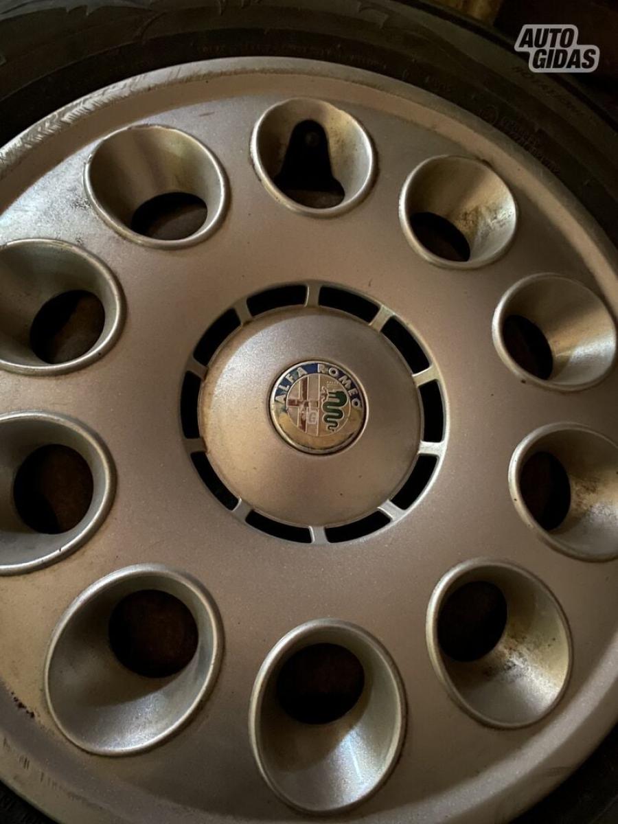Melns Alfa Romeo 156 2005 Joniškis, ar dzinēja tilpumu 1.90 L un nobraukumu 286 tūkst. km par 599 €, foto 21 vietnē AUTOMOTO.COM.LV