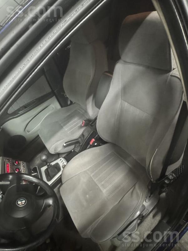 Альфа Ромео 156 2005 в Рига на AUTOMOTO.COM.LV Синий Альфа Ромео 156 2005 в Рига, объемом двигателя 1.90 л и пробегом 280 тыс. км за 2100 €, фото 10 на AUTOMOTO.COM.LV