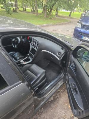 Brown Alfa Romeo 159 2007 in Riga, with an engine capacity of 1.90 L and mileage of 350 thousand km for 1175 €, photo 14 on AUTOMOTO.COM.LV