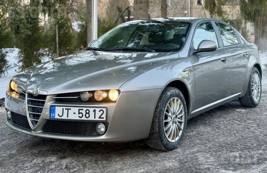 Grey Alfa Romeo 159 2006 in Riga, with an engine capacity of 2.20 L and mileage of 214 thousand km for 2590 €, photo 1 on AUTOMOTO.COM.LV