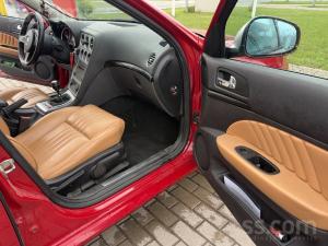 Red Alfa Romeo 159 2007 in Jurmala, with an engine capacity of 2.40 L and mileage of 235 thousand km for 4990 €, photo 18 on AUTOMOTO.COM.LV