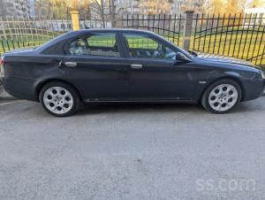 Melns Alfa Romeo 166 2004 Rīga, ar dzinēja tilpumu 2.40 L un nobraukumu 316 tūkst. km par 400 €, foto 3 vietnē AUTOMOTO.COM.LV
