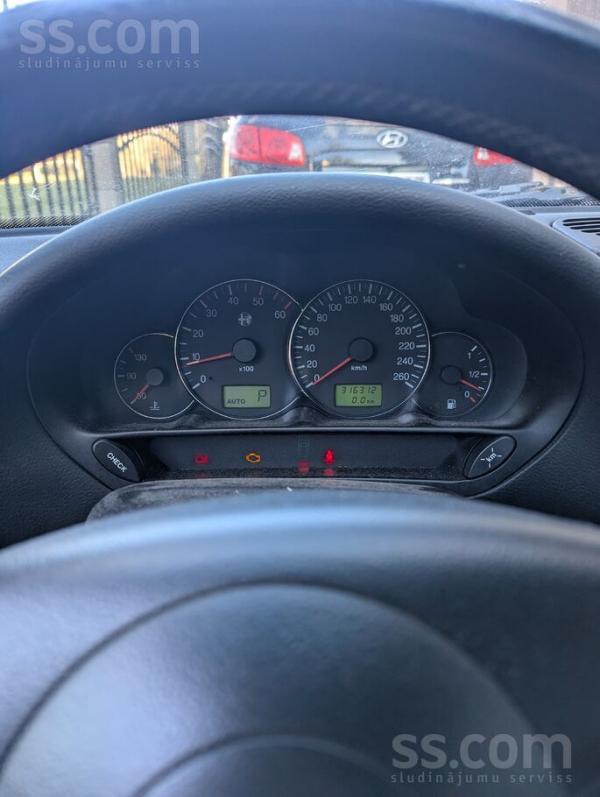 Black Alfa Romeo 166 2004 in Riga, with an engine capacity of 2.40 L and mileage of 316 thousand km for 400 €, photo 7 on AUTOMOTO.COM.LV