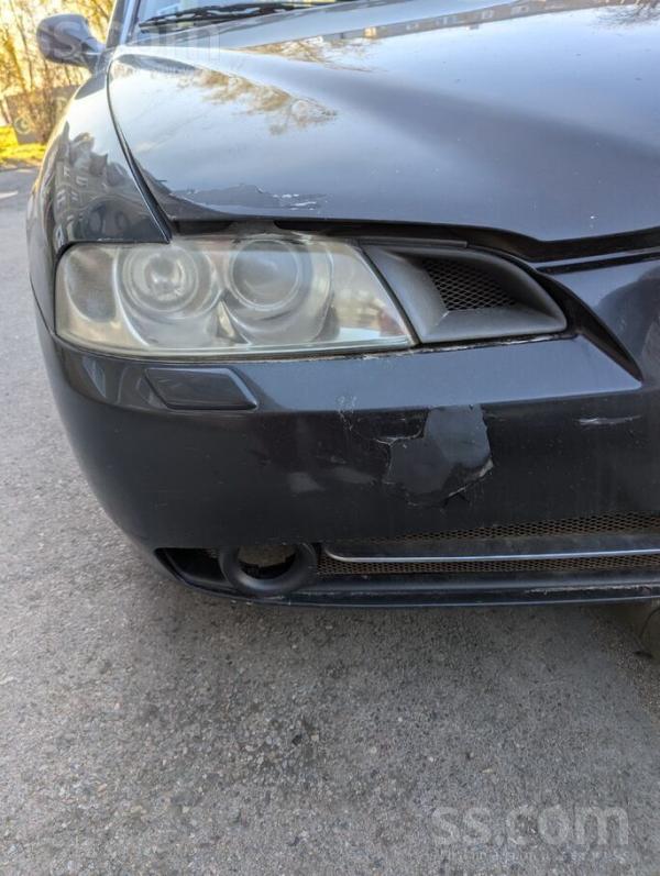 Black Alfa Romeo 166 2004 in Riga, with an engine capacity of 2.40 L and mileage of 316 thousand km for 400 €, photo 10 on AUTOMOTO.COM.LV