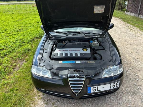 Black Alfa Romeo 166 2006 in Riga, with an engine capacity of 2.40 L and mileage of 222 thousand km for 2500 €, photo 1 on AUTOMOTO.COM.LV