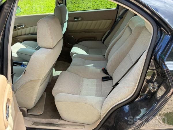 Black Alfa Romeo 166 2006 in Riga, with an engine capacity of 2.40 L and mileage of 222 thousand km for 2500 €, photo 4 on AUTOMOTO.COM.LV