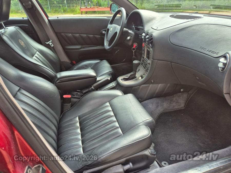 Red Alfa Romeo 166 1999 in Tallinn, with an engine capacity of 2.50 L and mileage of 179 thousand km for 8600 €, photo 16 on AUTOMOTO.COM.LV