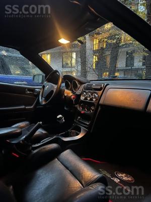 Black Alfa Romeo Spider 1997 in Riga, with an engine capacity of 2.00 L and mileage of 261 thousand km for 3900 €, photo 5 on AUTOMOTO.COM.LV