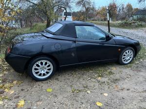 Black Alfa Romeo Spider 2001 in Vilnius, with an engine capacity of 2.00 L and mileage of 147 thousand km for 3999 €, photo 30 on AUTOMOTO.COM.LV