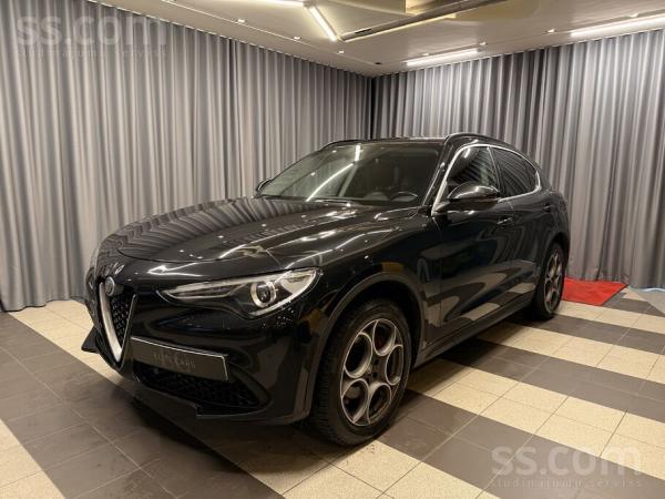 Black Alfa Romeo Stelvio 2018 in Riga, with an engine capacity of 2.00 L and mileage of 117 thousand km for 21900 €, photo 1 on AUTOMOTO.COM.LV
