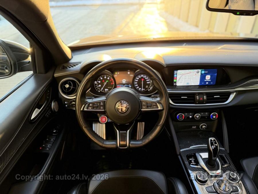Black Alfa Romeo Stelvio 2021 in Riga, with an engine capacity of 2.89 L and mileage of 81 thousand km for 43900 €, photo 6 on AUTOMOTO.COM.LV