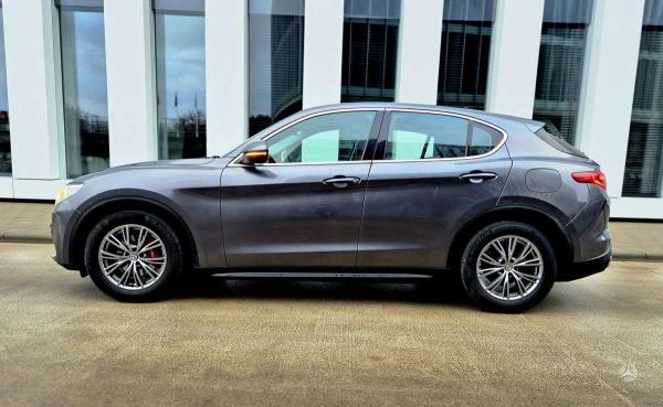 Brown Alfa Romeo Stelvio 2018 in Vilnius, with an engine capacity of 2.14 L and mileage of 167 thousand km for 13800 €, photo 4 on AUTOMOTO.COM.LV