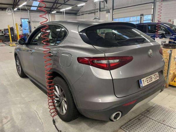 Grey Alfa Romeo Stelvio 2018 in Siauliai, with an engine capacity of 2.14 L and mileage of 190 thousand km for 8990 €, photo 3 on AUTOMOTO.COM.LV