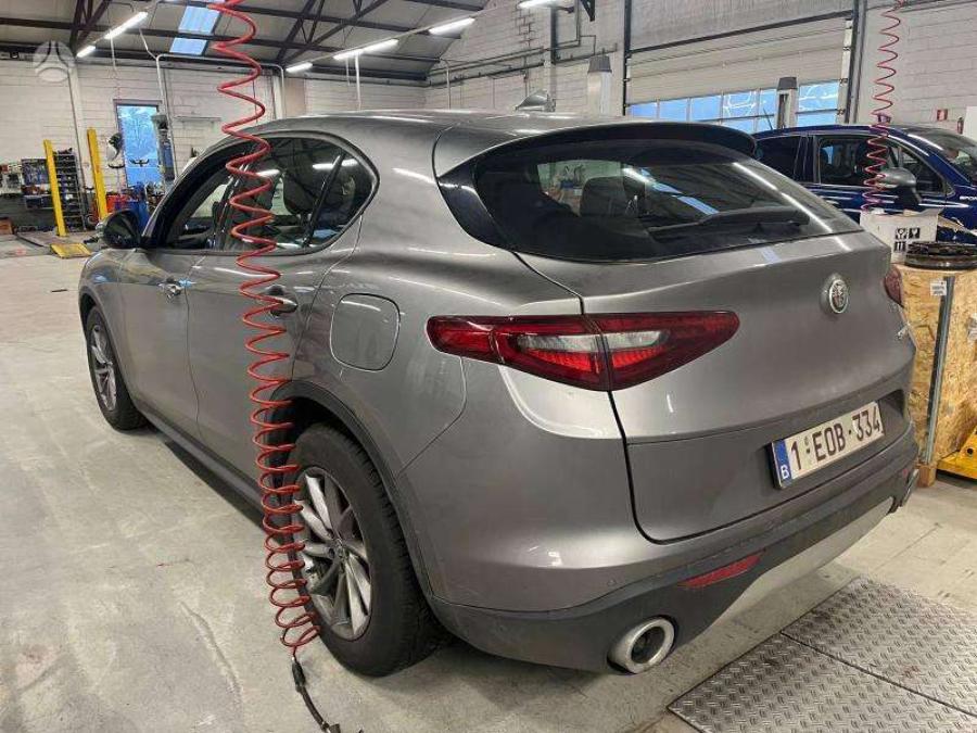 Grey Alfa Romeo Stelvio 2018 in Siauliai, with an engine capacity of 2.14 L and mileage of 190 thousand km for 8990 €, photo 3 on AUTOMOTO.COM.LV