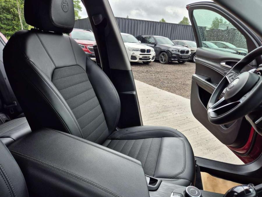 Red Alfa Romeo Stelvio 2018 in Utena, with an engine capacity of 2.14 L and mileage of 254 thousand km for 12990 €, photo 20 on AUTOMOTO.COM.LV