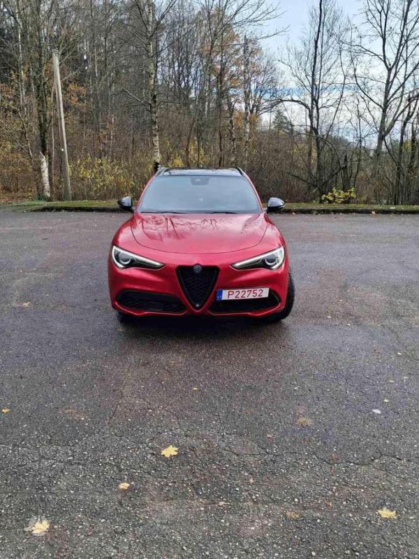 Red Alfa Romeo Stelvio 2023 in Plunge, with an engine capacity of 2.00 L and mileage of 12 thousand km for 29900 €, photo 1 on AUTOMOTO.COM.LV