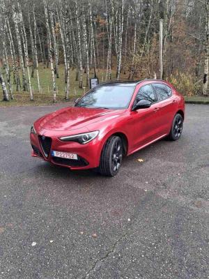 Red Alfa Romeo Stelvio 2023 in Plunge, with an engine capacity of 2.00 L and mileage of 12 thousand km for 29900 €, photo 2 on AUTOMOTO.COM.LV