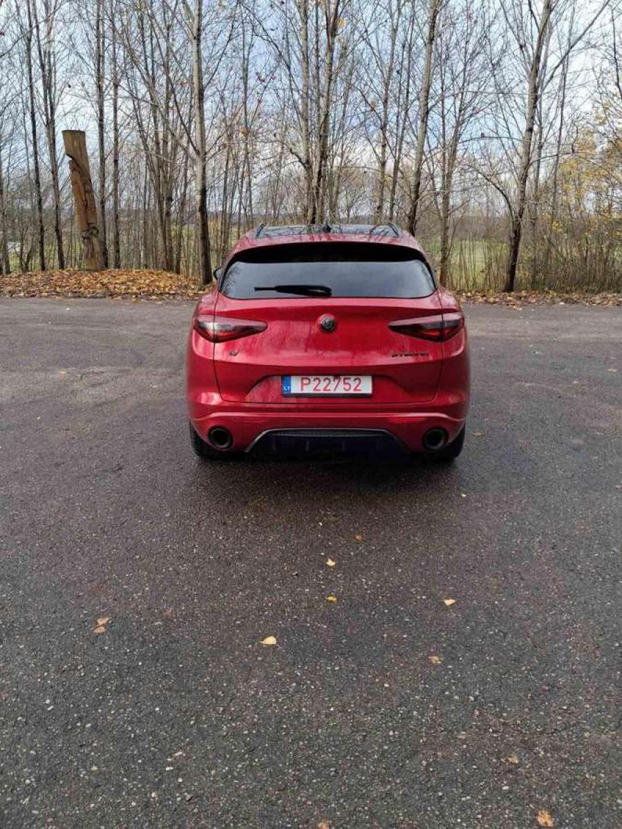 Red Alfa Romeo Stelvio 2023 in Plunge, with an engine capacity of 2.00 L and mileage of 12 thousand km for 29900 €, photo 5 on AUTOMOTO.COM.LV