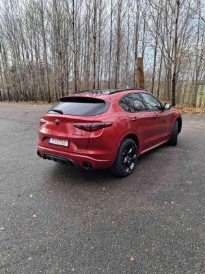 Red Alfa Romeo Stelvio 2023 in Plunge, with an engine capacity of 2.00 L and mileage of 12 thousand km for 29900 €, photo 6 on AUTOMOTO.COM.LV