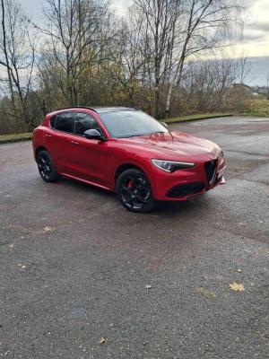 Red Alfa Romeo Stelvio 2023 in Plunge, with an engine capacity of 2.00 L and mileage of 12 thousand km for 29900 €, photo 8 on AUTOMOTO.COM.LV