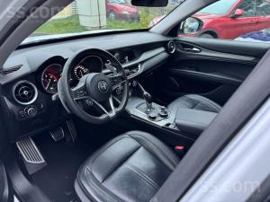 White Alfa Romeo Stelvio 2017 in Riga, with an engine capacity of 2.20 L and mileage of 186 thousand km for 17400 €, photo 9 on AUTOMOTO.COM.LV