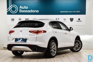 White Alfa Romeo Stelvio 2018 in Riga, with an engine capacity of 2.00 L and mileage of 138 thousand km for 21990 €, photo 3 on AUTOMOTO.COM.LV