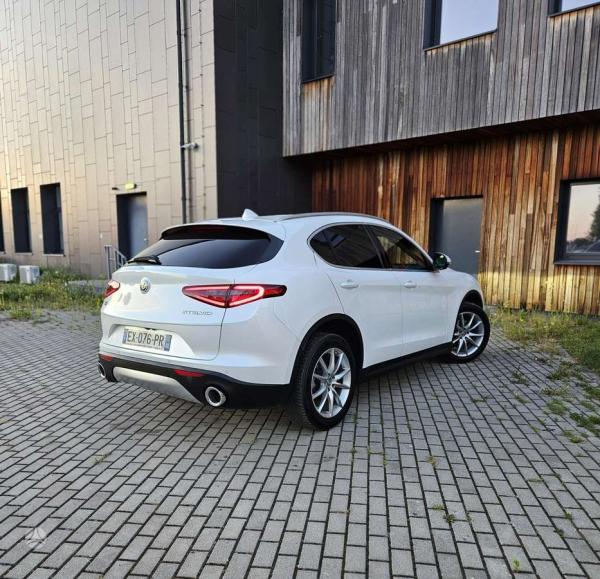 White Alfa Romeo Stelvio 2018 in Taurage, with an engine capacity of 2.14 L and mileage of 209 thousand km for 12800 €, photo 2 on AUTOMOTO.COM.LV