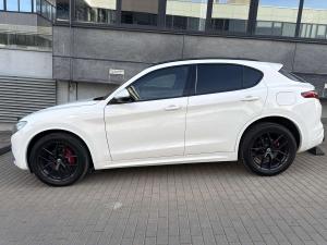 White Alfa Romeo Stelvio 2021 in Vilnius, with an engine capacity of 2.00 L and mileage of 64 thousand km for 18900 €, photo 4 on AUTOMOTO.COM.LV