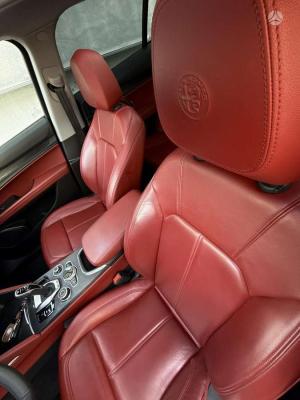 White Alfa Romeo Stelvio 2021 in Vilnius, with an engine capacity of 2.00 L and mileage of 64 thousand km for 18900 €, photo 20 on AUTOMOTO.COM.LV