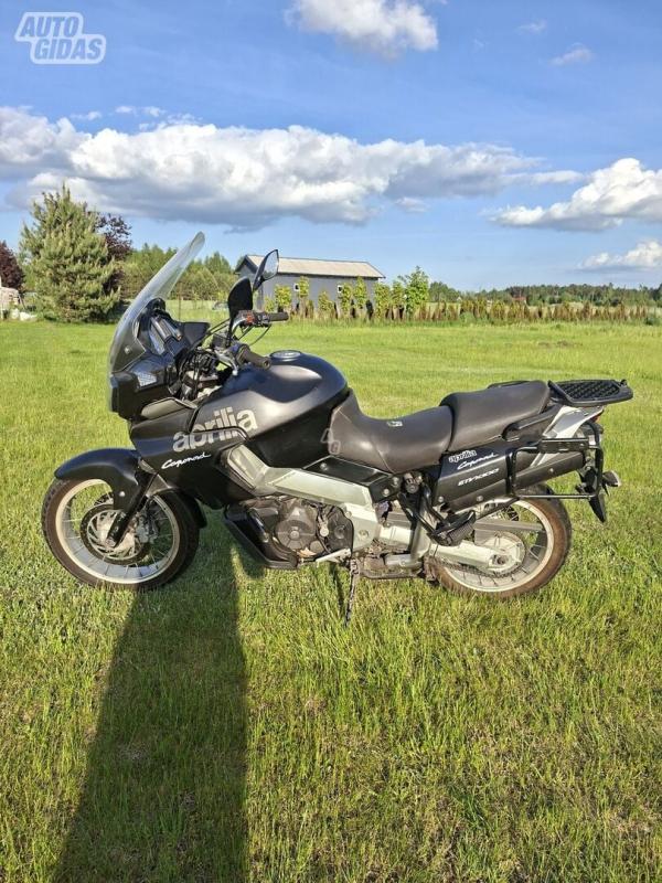 Pelēks Aprilia Caponord 2004 Panevēža, ar dzinēja tilpumu 1.00 L un nobraukumu 62 tūkst. km par 2500 €, foto 6 vietnē AUTOMOTO.COM.LV