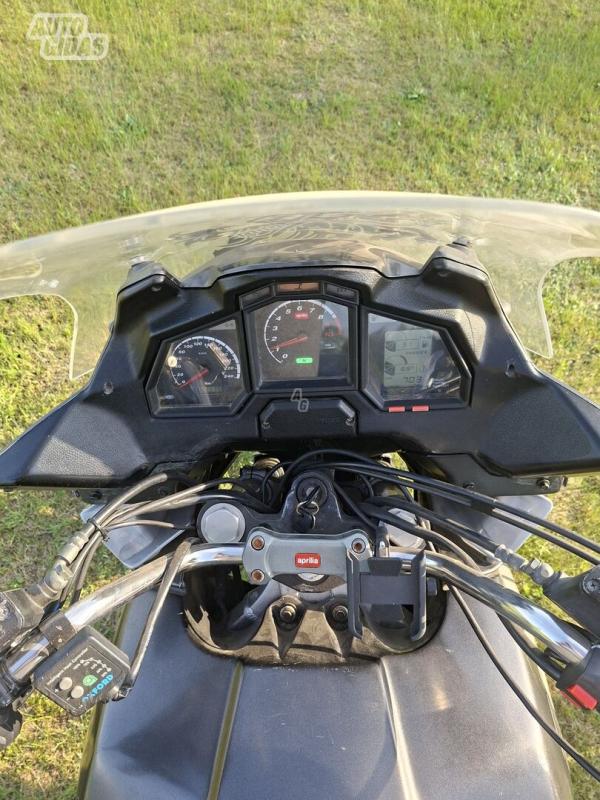 Pelēks Aprilia Caponord 2004 Panevēža, ar dzinēja tilpumu 1.00 L un nobraukumu 62 tūkst. km par 2500 €, foto 10 vietnē AUTOMOTO.COM.LV
