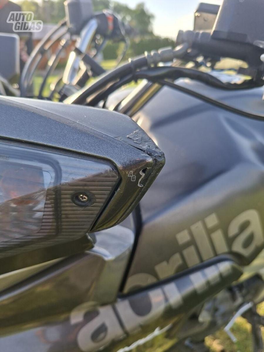 Grey Aprilia Caponord 2004 in Panevezys, with an engine capacity of 1.00 L and mileage of 62 thousand km for 2500 €, photo 14 on AUTOMOTO.COM.LV