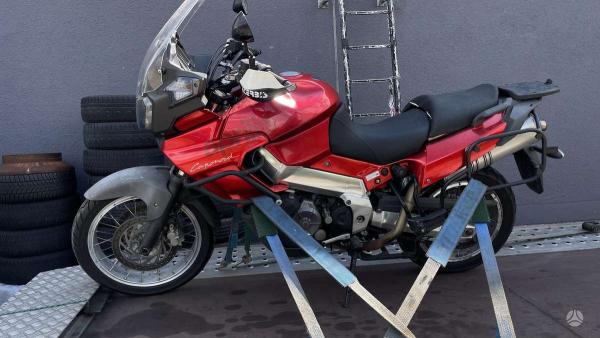 Red Aprilia Caponord 2001 in Telschi, with an engine capacity of 1.00 L and mileage of 27 thousand km for 2600 €, photo 3 on AUTOMOTO.COM.LV
