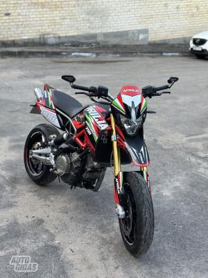 Black Aprilia Dorsoduro 2012 in Siauliai, with an engine capacity of 0.75 L and mileage of 27 thousand km for 3999 €, photo 11 on AUTOMOTO.COM.LV