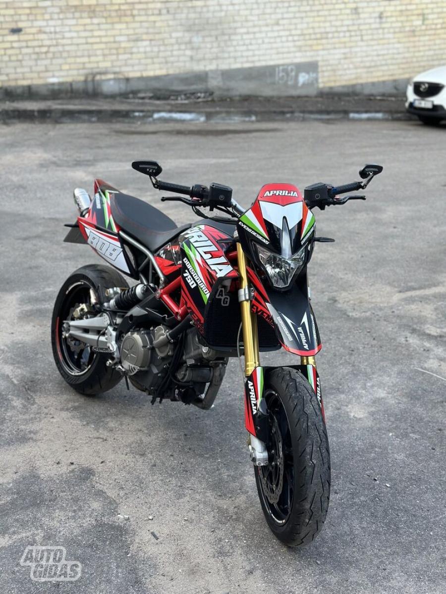 Black Aprilia Dorsoduro 2012 in Siauliai, with an engine capacity of 0.75 L and mileage of 27 thousand km for 3999 €, photo 11 on AUTOMOTO.COM.LV