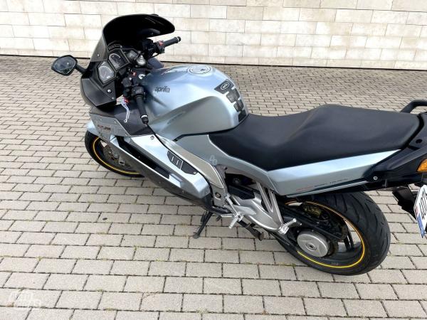 Aprilia RST 2001 in Vilnius on AUTOMOTO.COM.LV Grey Aprilia RST 2001 in Vilnius, with an engine capacity of 1.00 L and mileage of 84 thousand km for 2600 €, photo 11 on AUTOMOTO.COM.LV