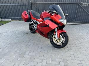 Red Aprilia RST 2002 in Panevezys, with an engine capacity of 1.00 L and mileage of 36 thousand km for 2150 €, photo  on AUTOMOTO.COM.LV