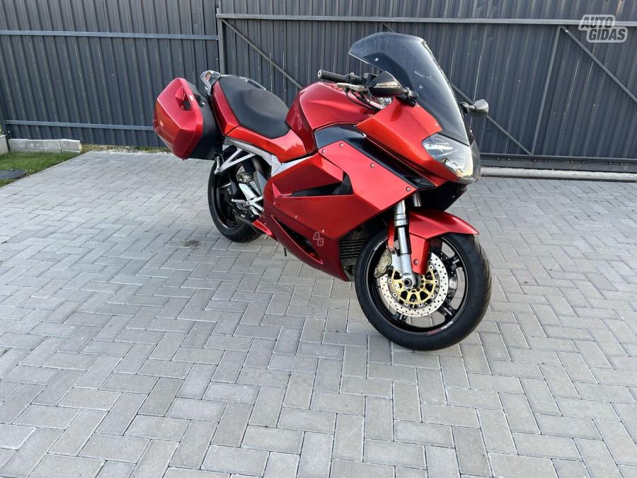 Red Aprilia RST 2002 in Panevezys, with an engine capacity of 1.00 L and mileage of 36 thousand km for 2150 €, photo 1 on AUTOMOTO.COM.LV