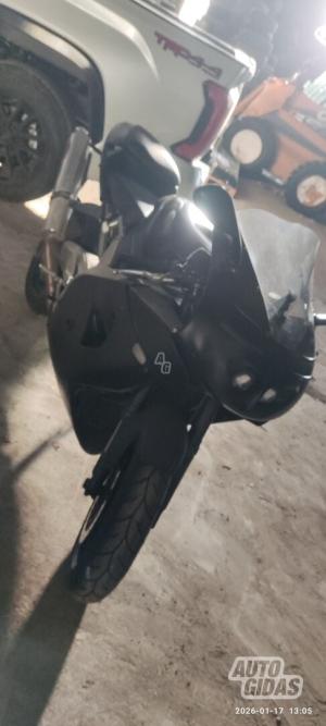 Black Aprilia RSV 2002 in Vilnius, with an engine capacity of 1.00 L and mileage of 0 thousand km for 1550 €, photo 9 on AUTOMOTO.COM.LV