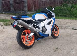 Red Aprilia RSV 2005 in Vilnius, with an engine capacity of 1.00 L and mileage of 34 thousand km for 2000 €, photo  on AUTOMOTO.COM.LV